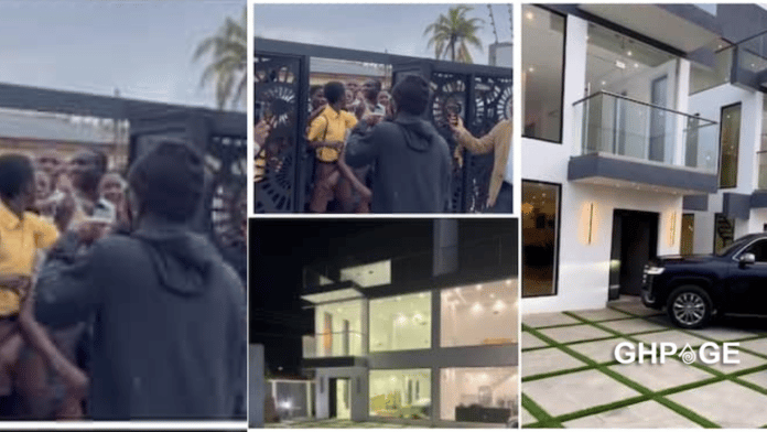 Shatta Wale sprays cash on his fans to unveil his new house - GhPage