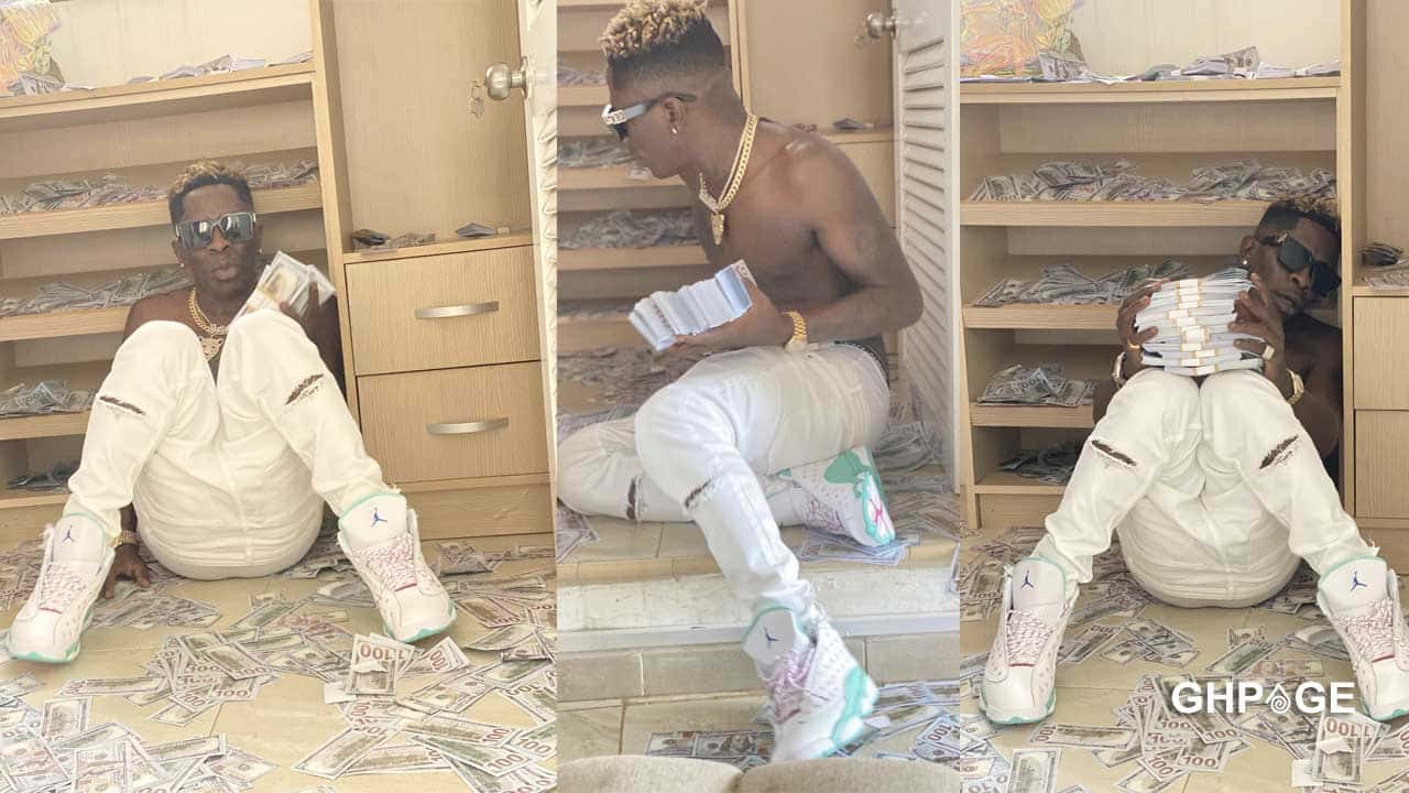 Ghanaians react to photos of Shatta Wale flaunting dollars - GhPage