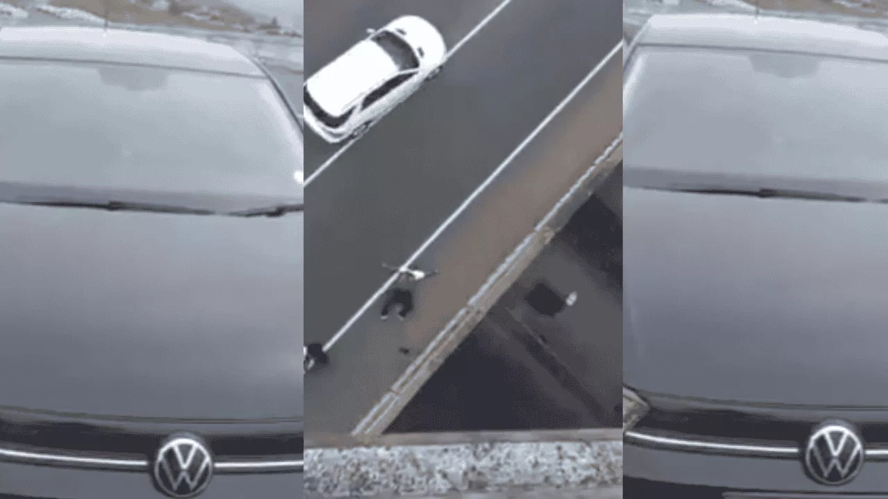 Man parks his car to jump over the bridge - GhPage